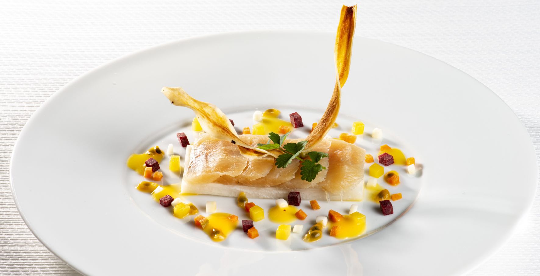 Gravlaxforel, vinaigrette van wintergroenten en -fruit | Horeca Magazine